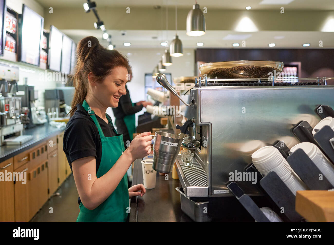 Starbucks worker beverage hi-res stock photography and images - Alamy