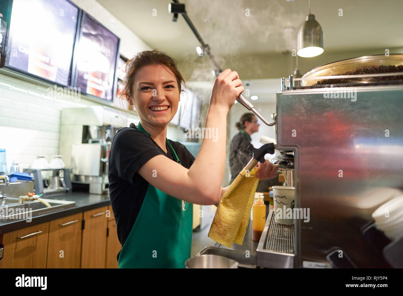 Starbucks worker beverage hi-res stock photography and images - Alamy