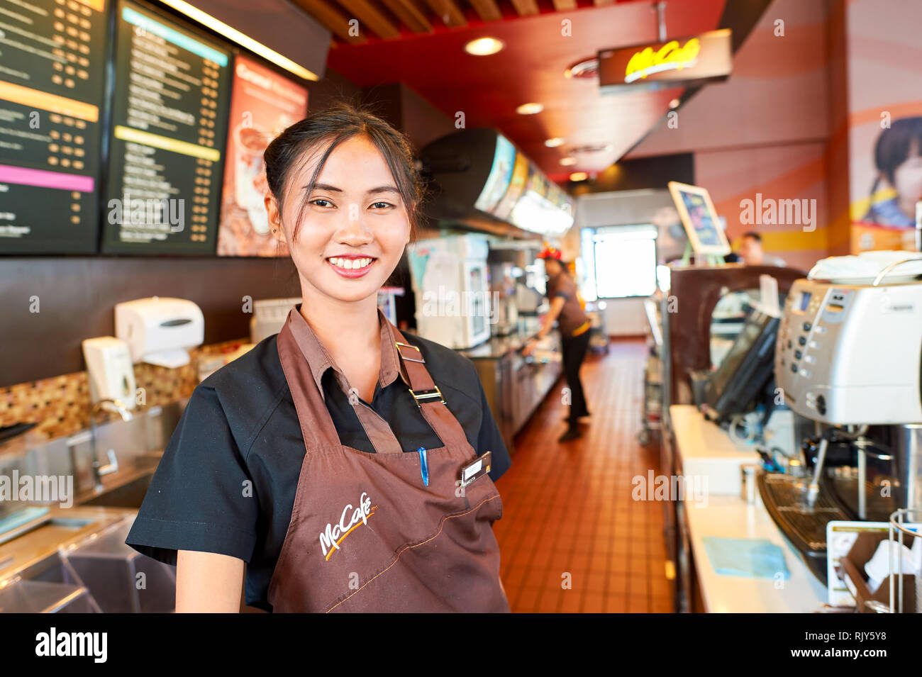 PATTAYA, THAILAND - FEBRUARY 21, 2016: worker at McCafe in Thailand ...