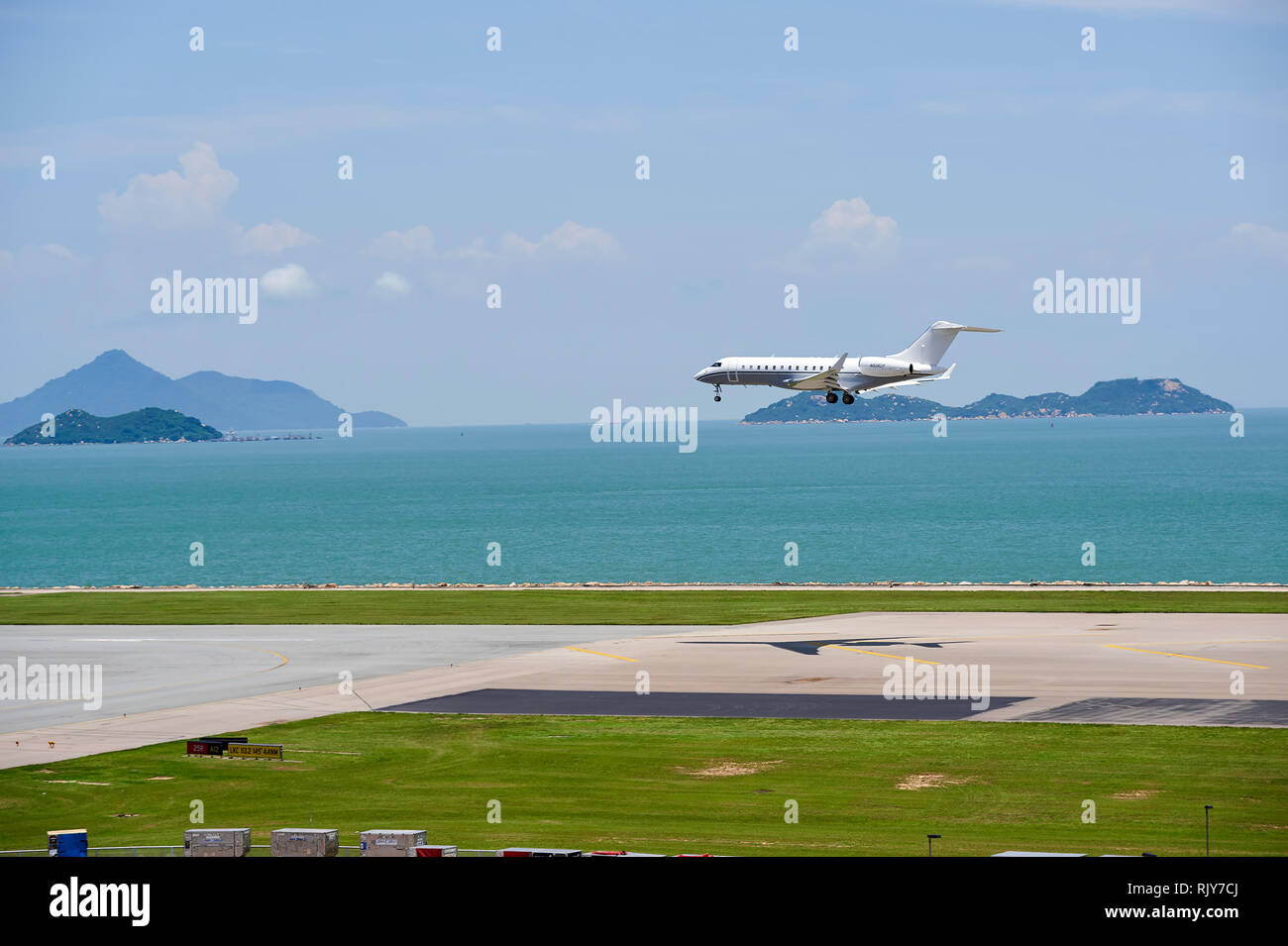 HONG KONG - JUNE 04, 2015: Bombardier Global Express aircraft landing ...