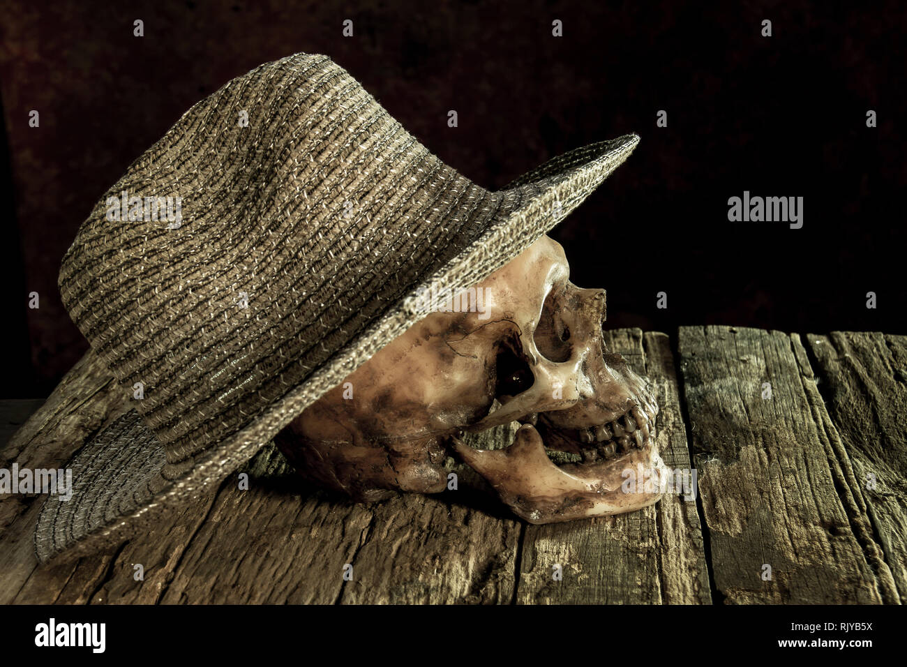 Still life skull . Cap machine weave Stock Photo - Alamy