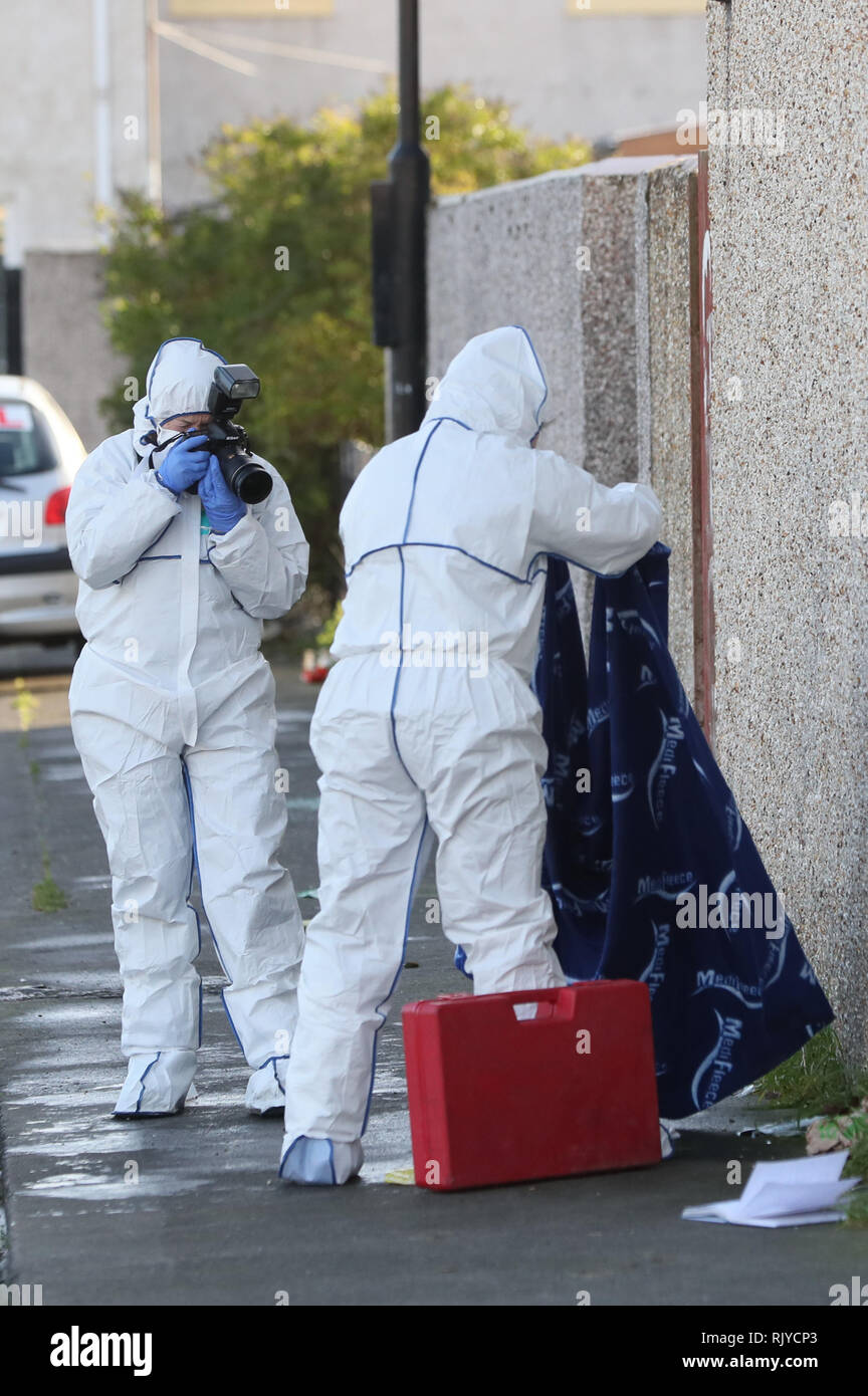 Forensic investigators at the scene in Marigold Crescent in the ...