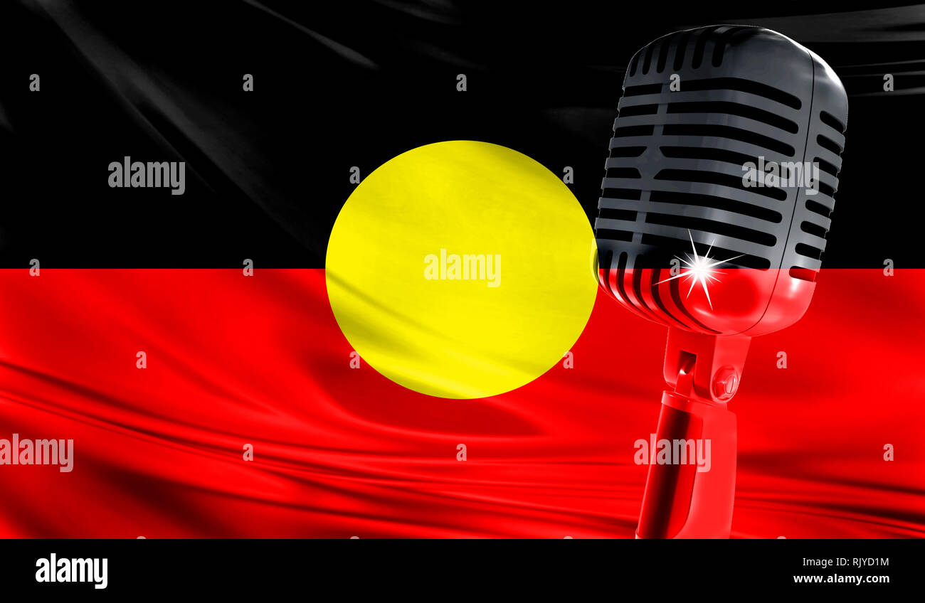 Microphone on fabric background of flag of Australian Aboriginal close ...