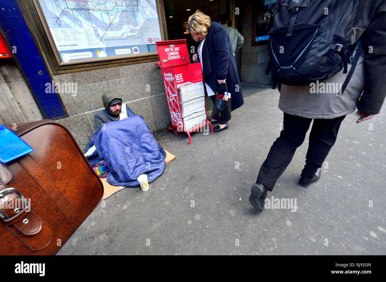 London, England, UK. Homeless man outside Holborn underground station ...