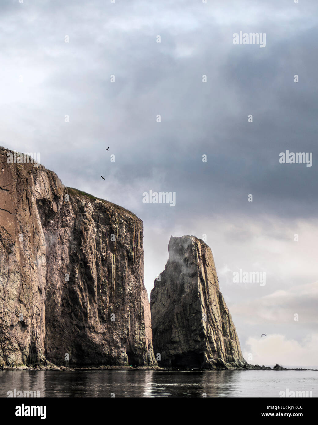 An uncommon view of the Percé Rock in northern Quebec Stock Photo - Alamy