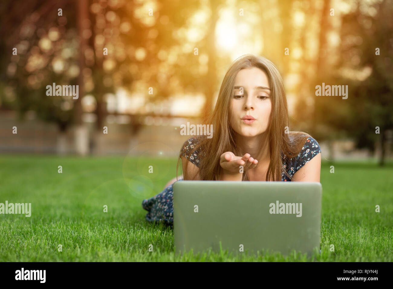 Woman kisses computer hi-res stock photography and images - Alamy