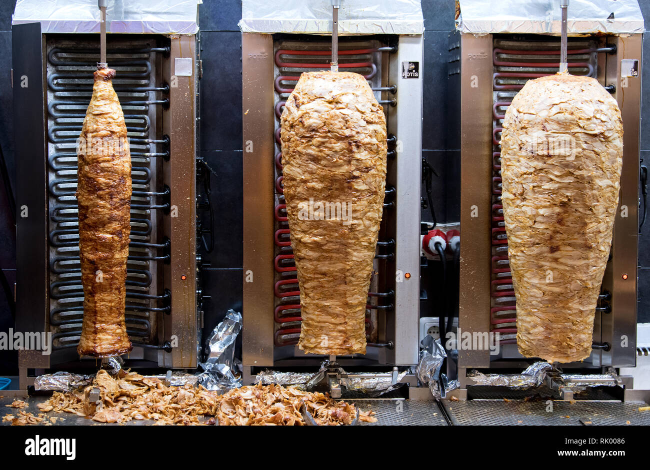 07 February 2019, Bavaria, München: Kebab skewers turn in a snack bar ...