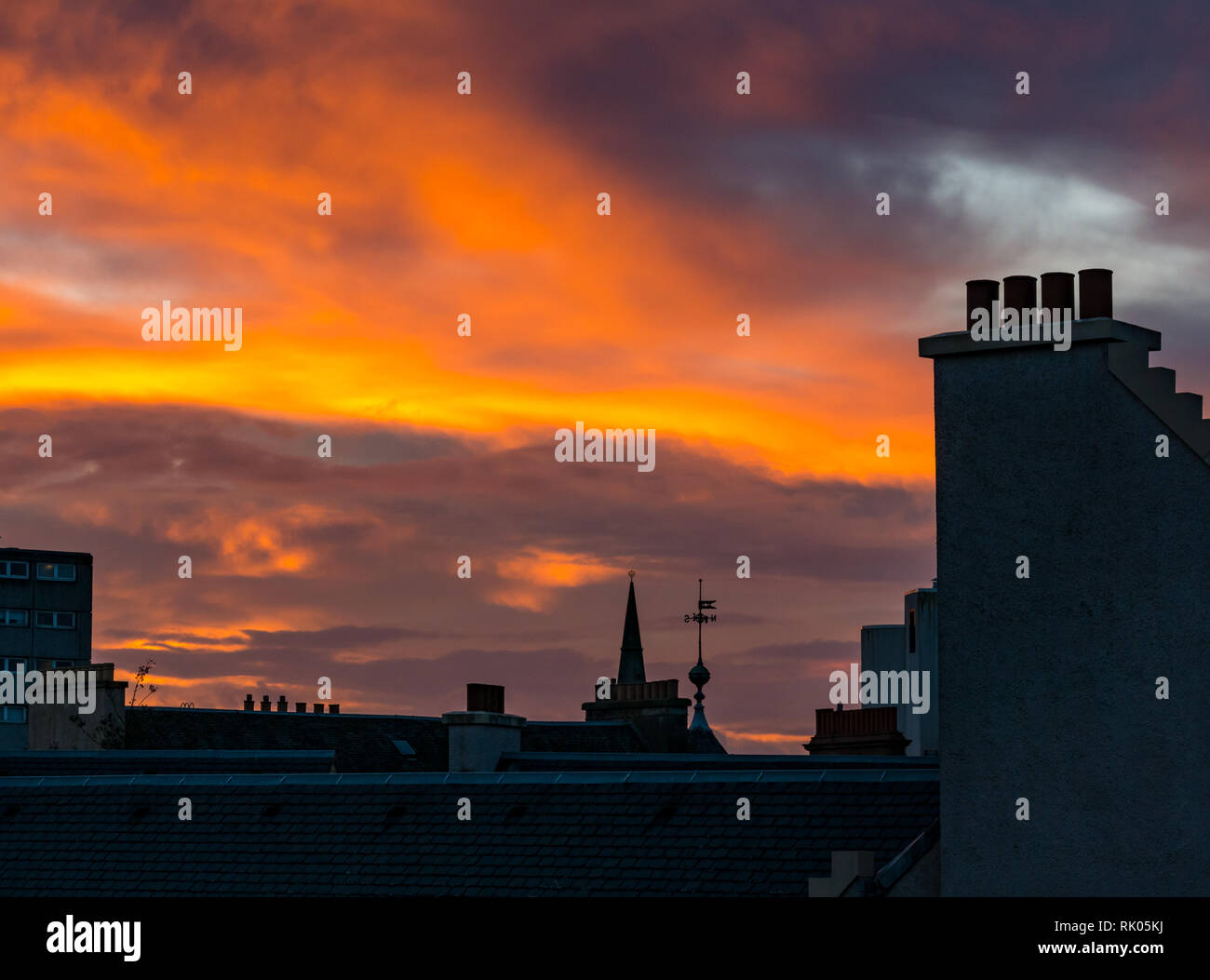 Roof top chimney sunset silhouette hi-res stock photography and images ...