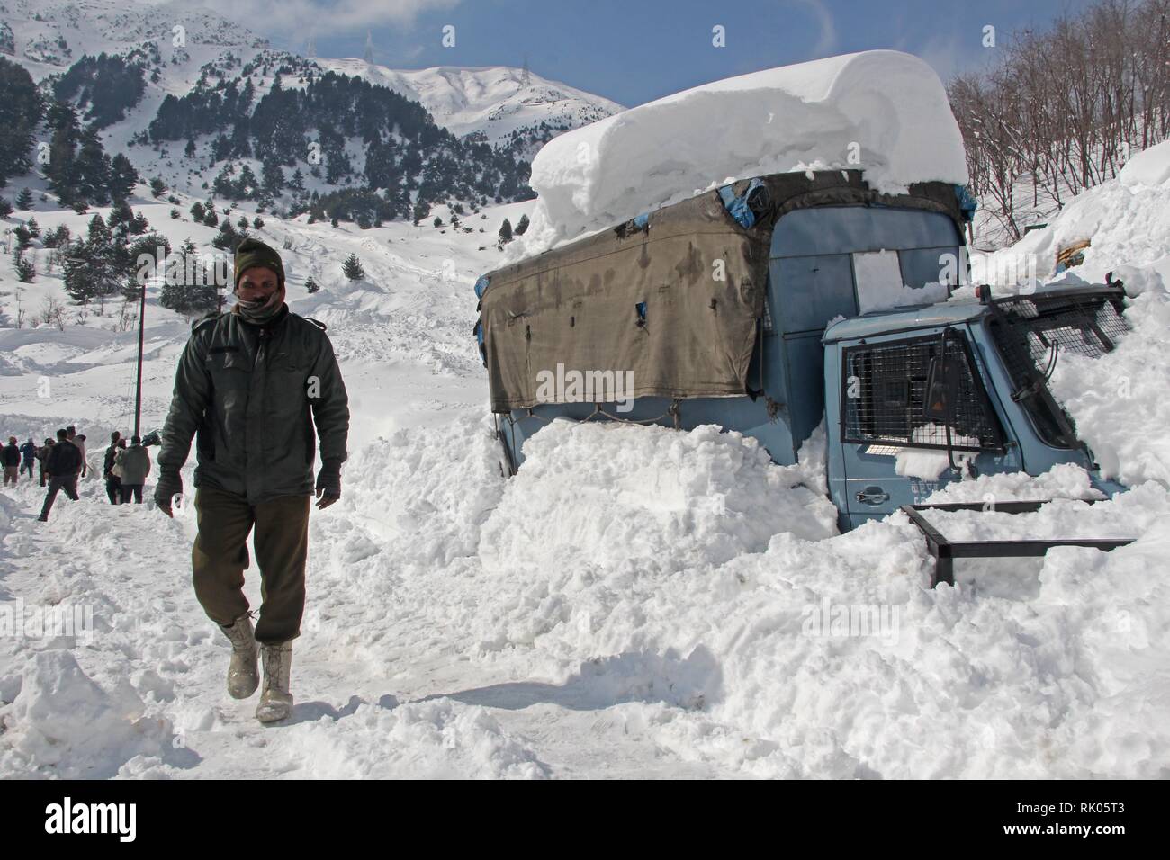 Man buried in heavy snow hi-res stock photography and images - Alamy