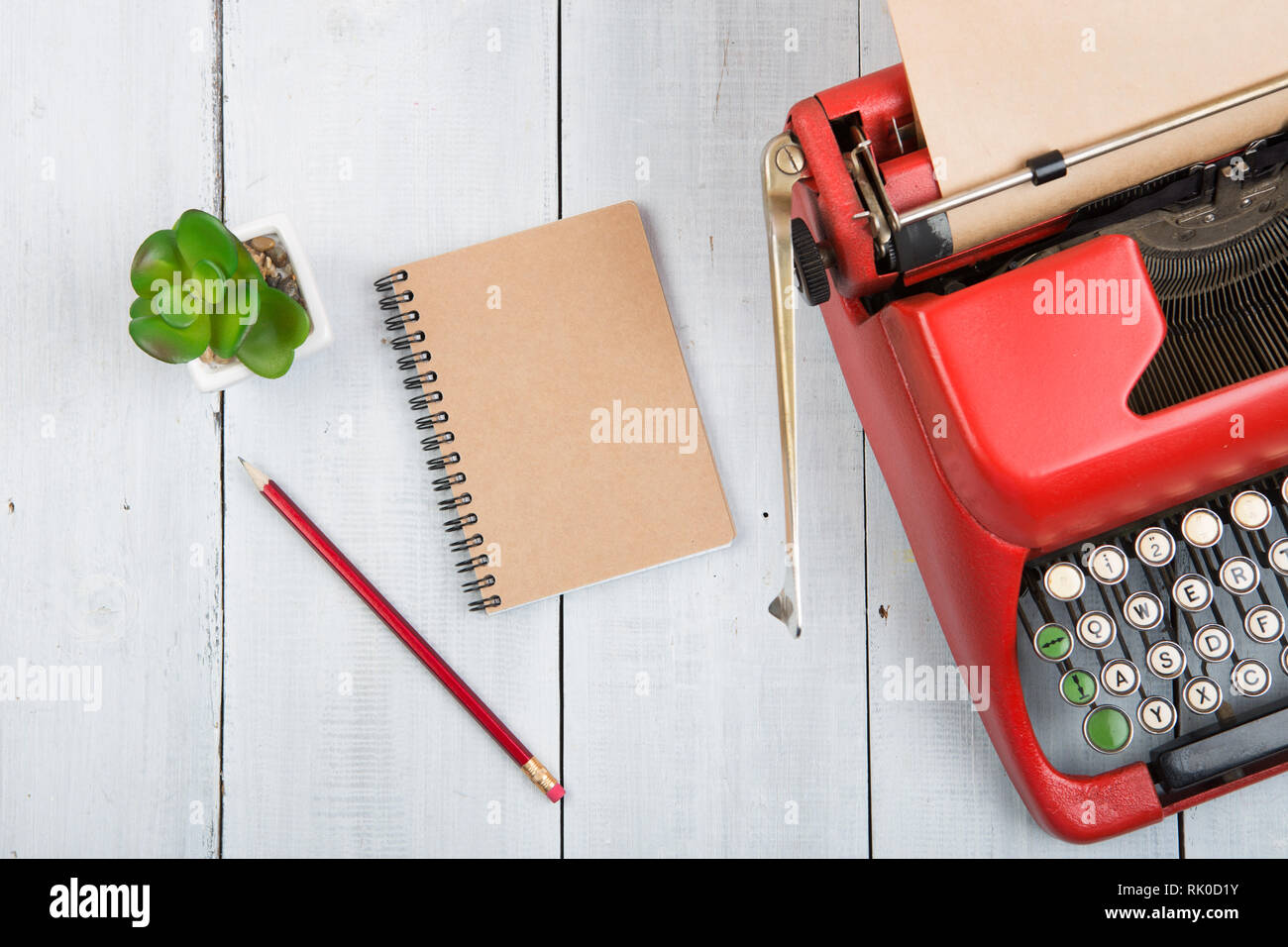 Writer or journalist workplace - vintage red typewriter on the white ...