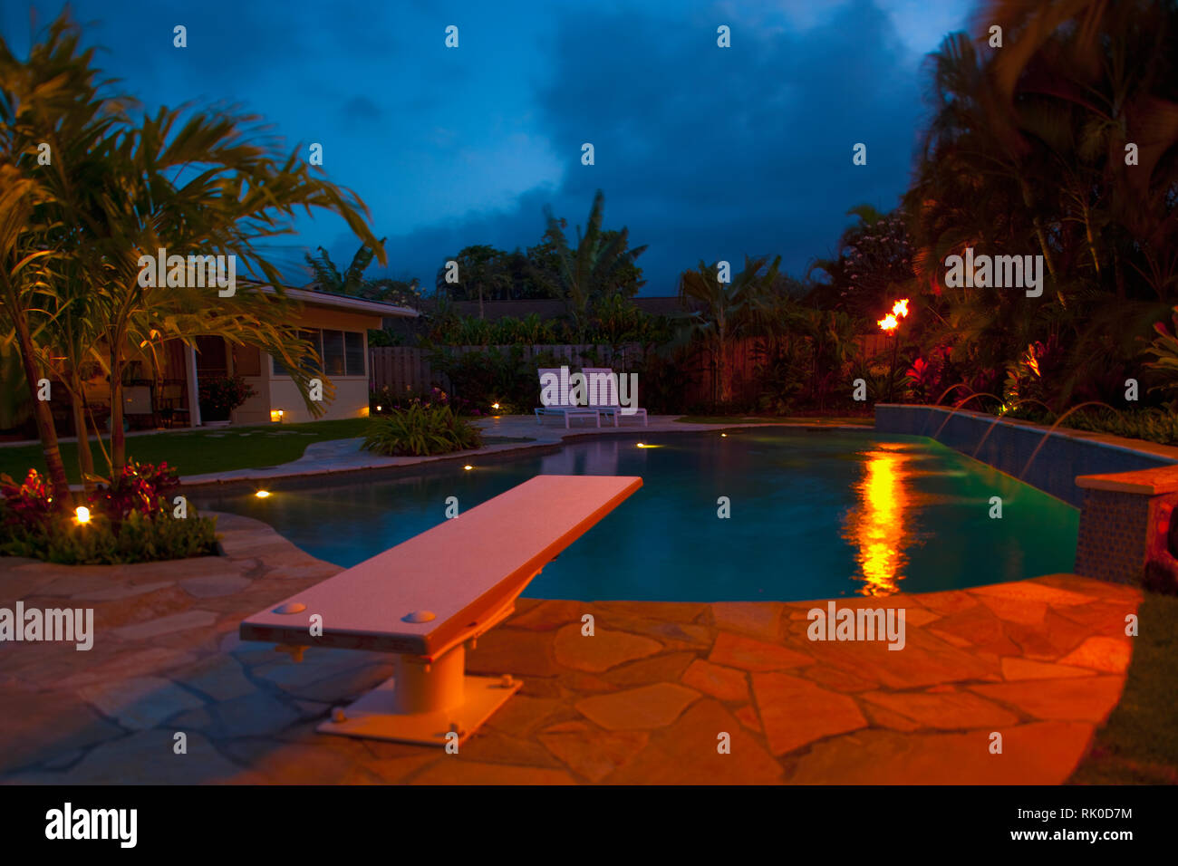 Tropical Backyard Pool at Night Stock Photo - Alamy