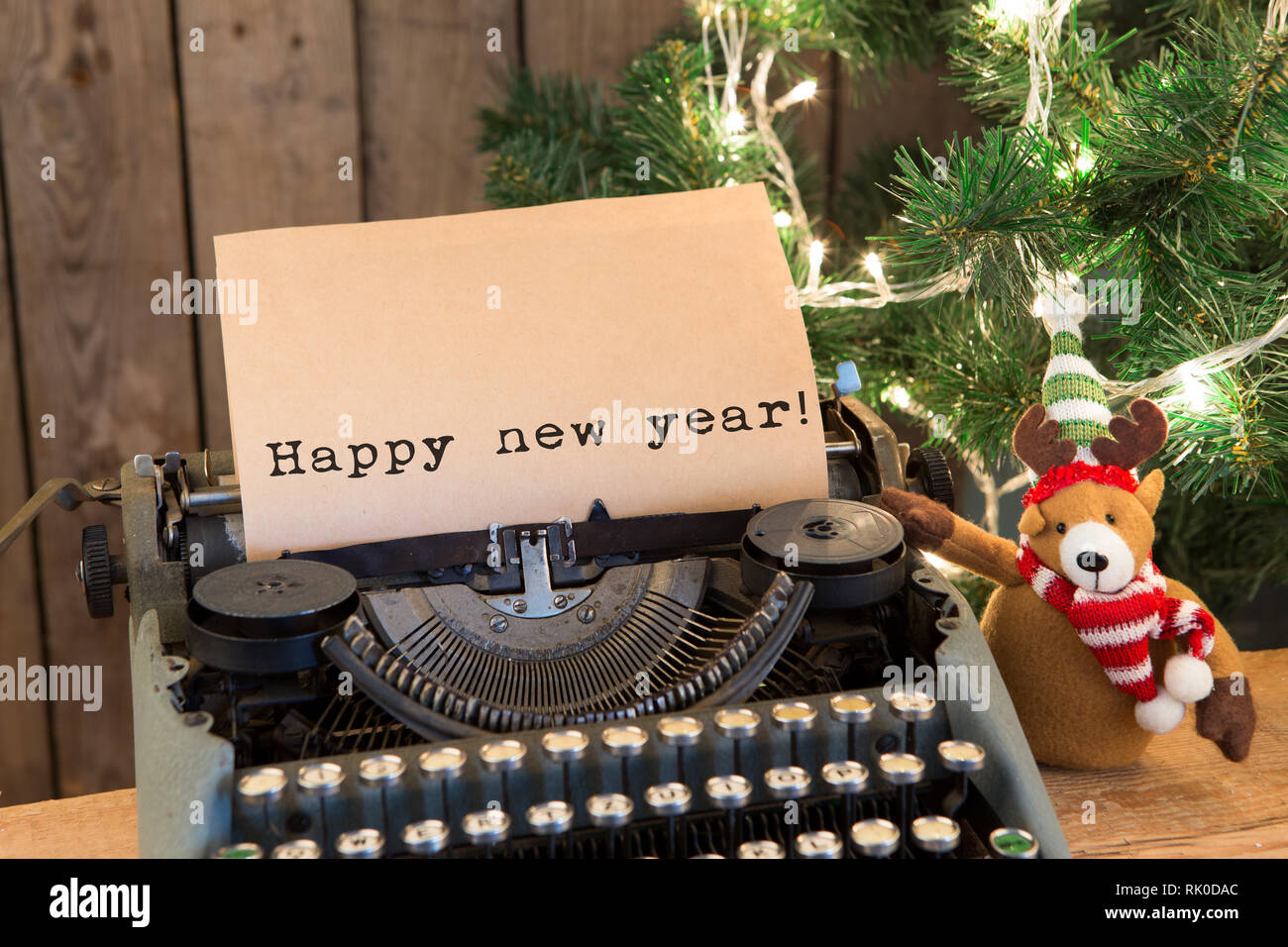 Christmas concept - Typewriter with the inscription, fir branches and ...