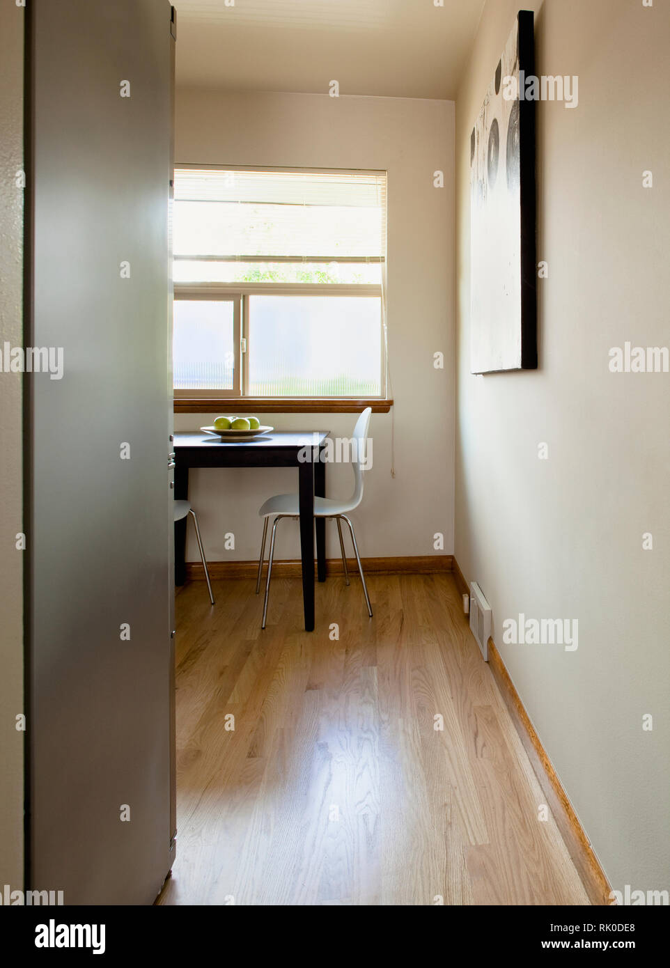Small Table in a Sparse Room Stock Photo - Alamy