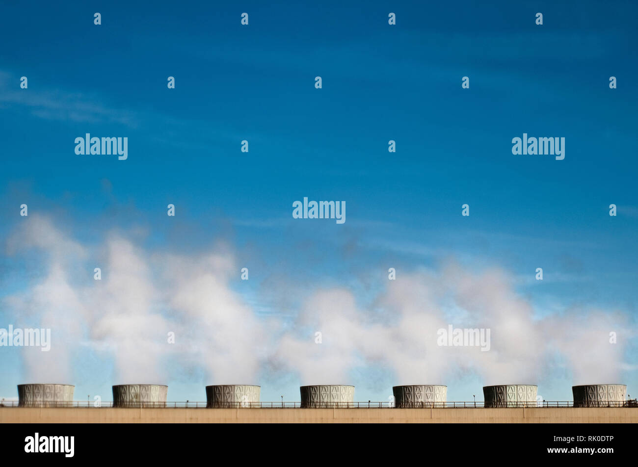 Pollution emitting from cooling towers Stock Photo - Alamy
