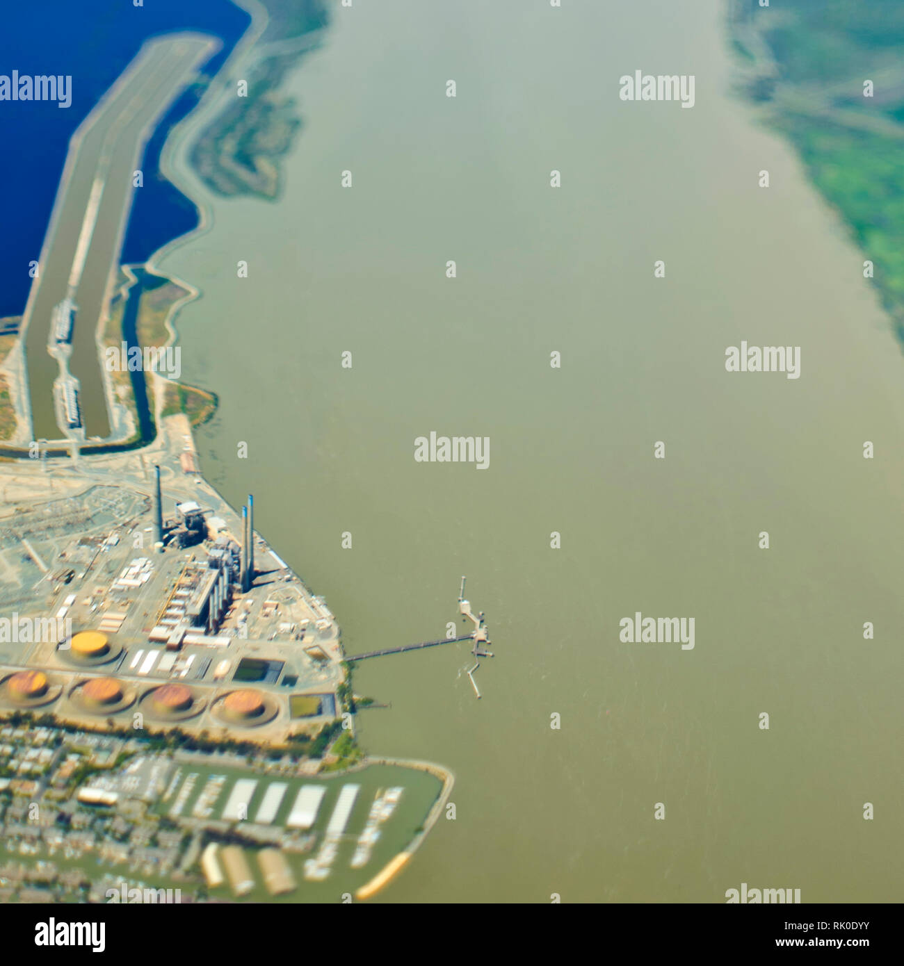 Industrial Plant on a Waterfront Stock Photo - Alamy