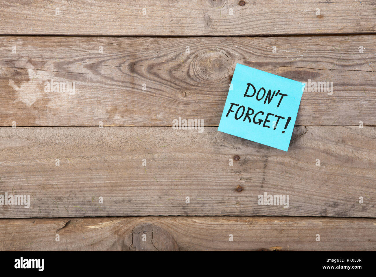 Don't forget inscription on colorful stickers on blackboard Stock Photo ...