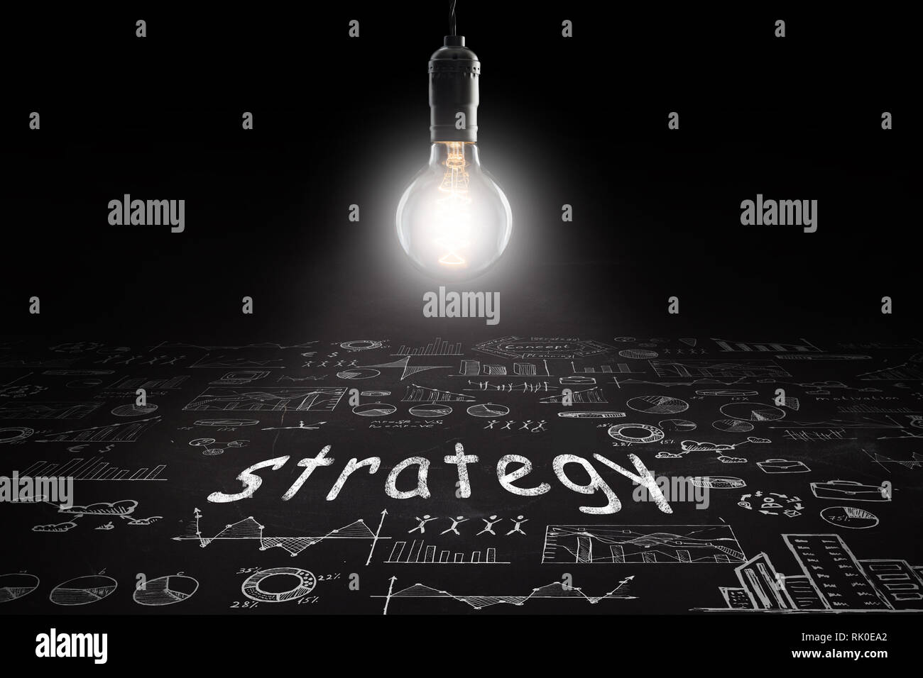 Business concept - word 'Strategy ', sketch with schemes and graphs on ...