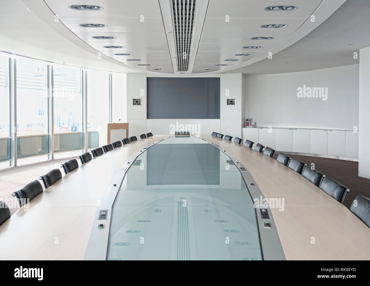 Television and large table in modern conference room Stock Photo - Alamy