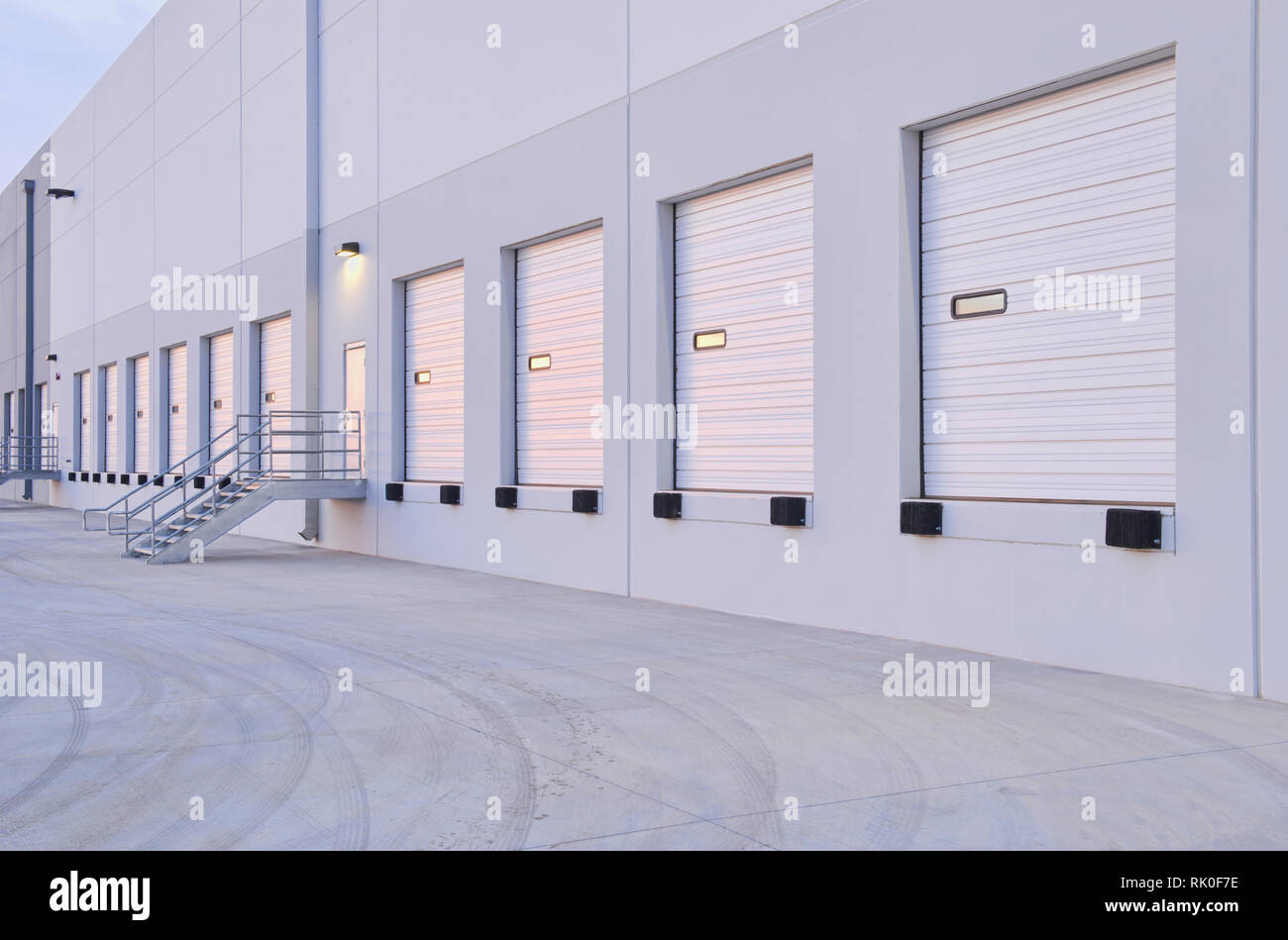 Closed doors of warehouse loading dock Stock Photo - Alamy