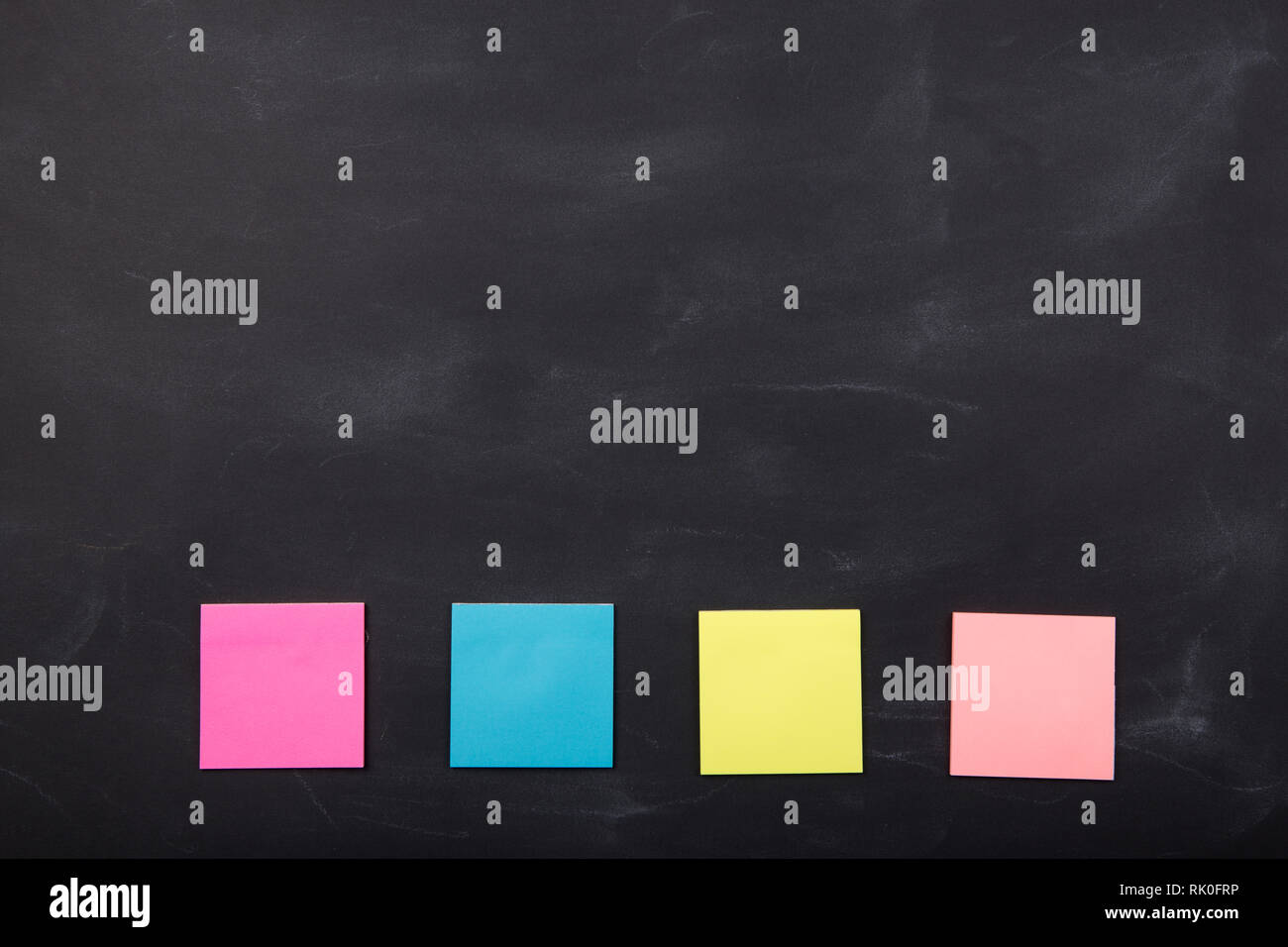 Colorful sticky notes on the blank blackboard Stock Photo - Alamy