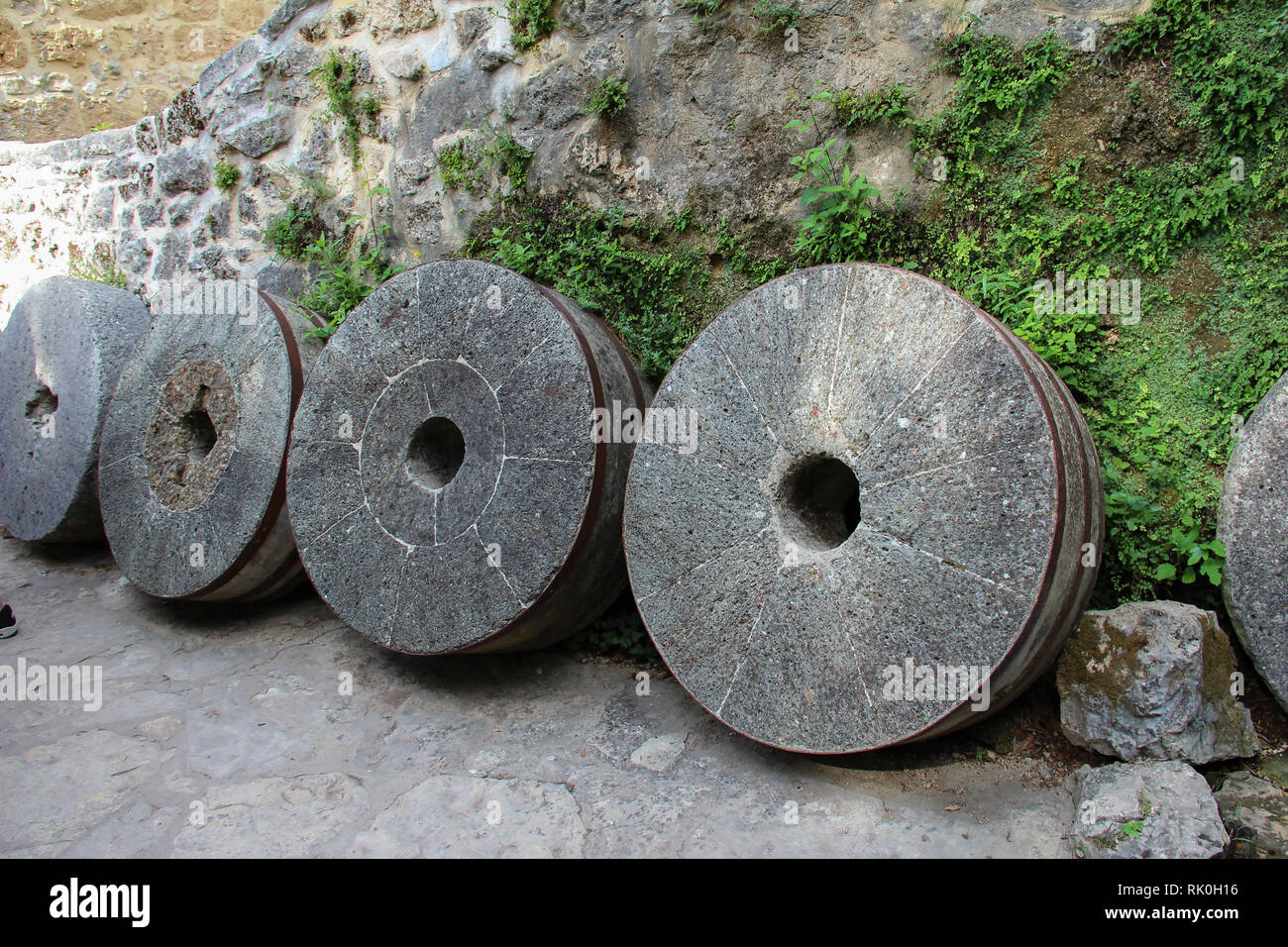 Old millstones. A traditional European tool to mill the flour Stock ...