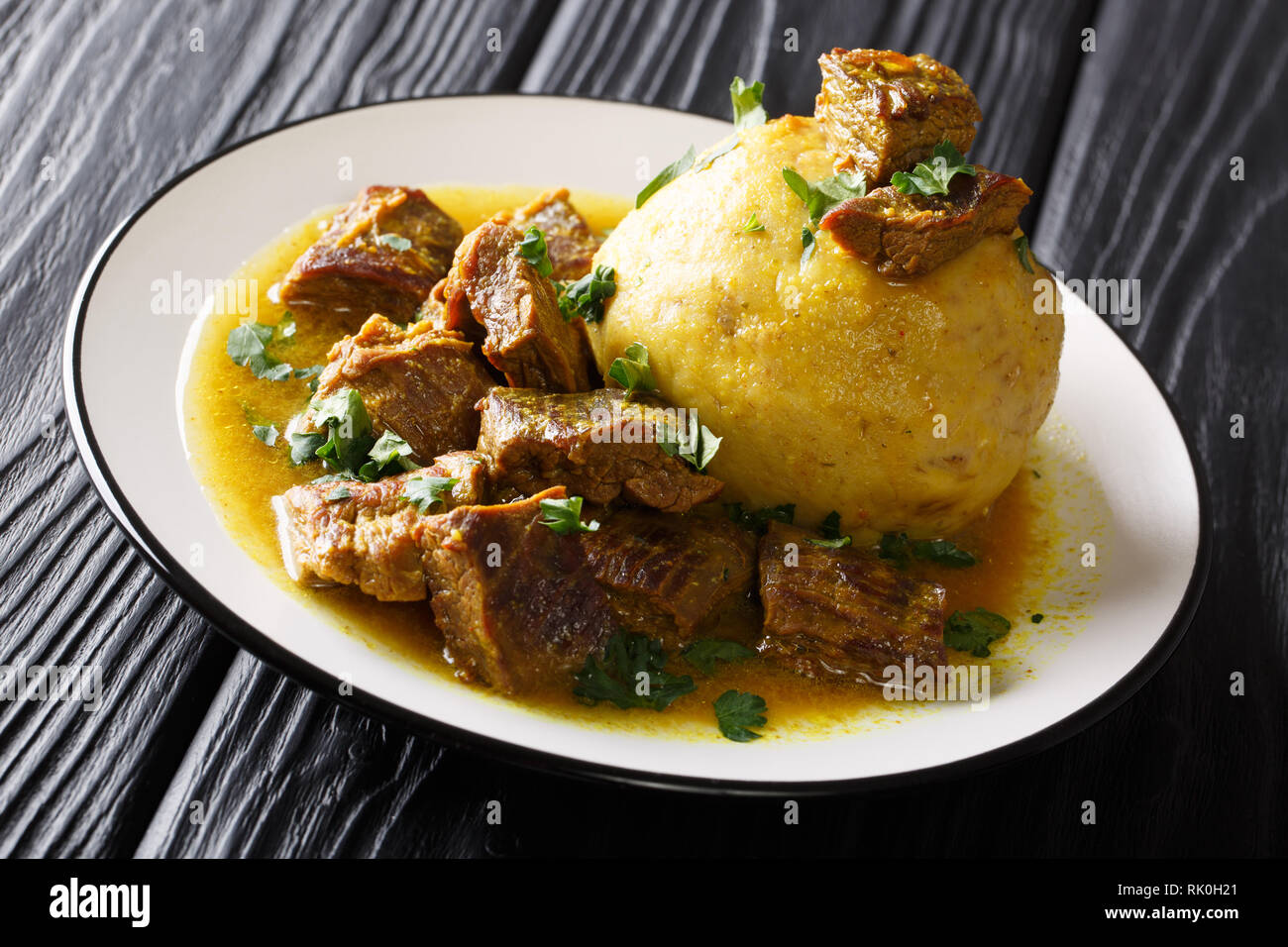 Traditional Mofongo with plantains, garlic and chicharron served with ...