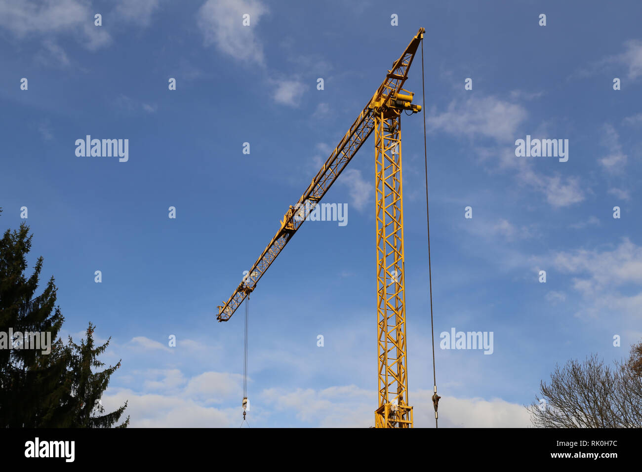 Crane. Crane on a blue sky background Stock Photo - Alamy