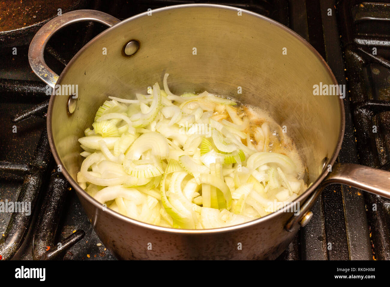 Onions fried in pan on hi-res stock photography and images - Alamy