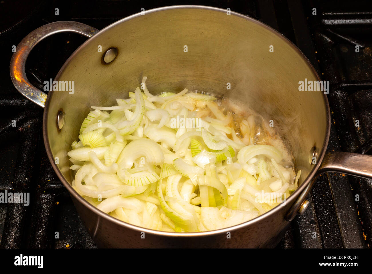 Onions fried in pan on hi-res stock photography and images - Alamy