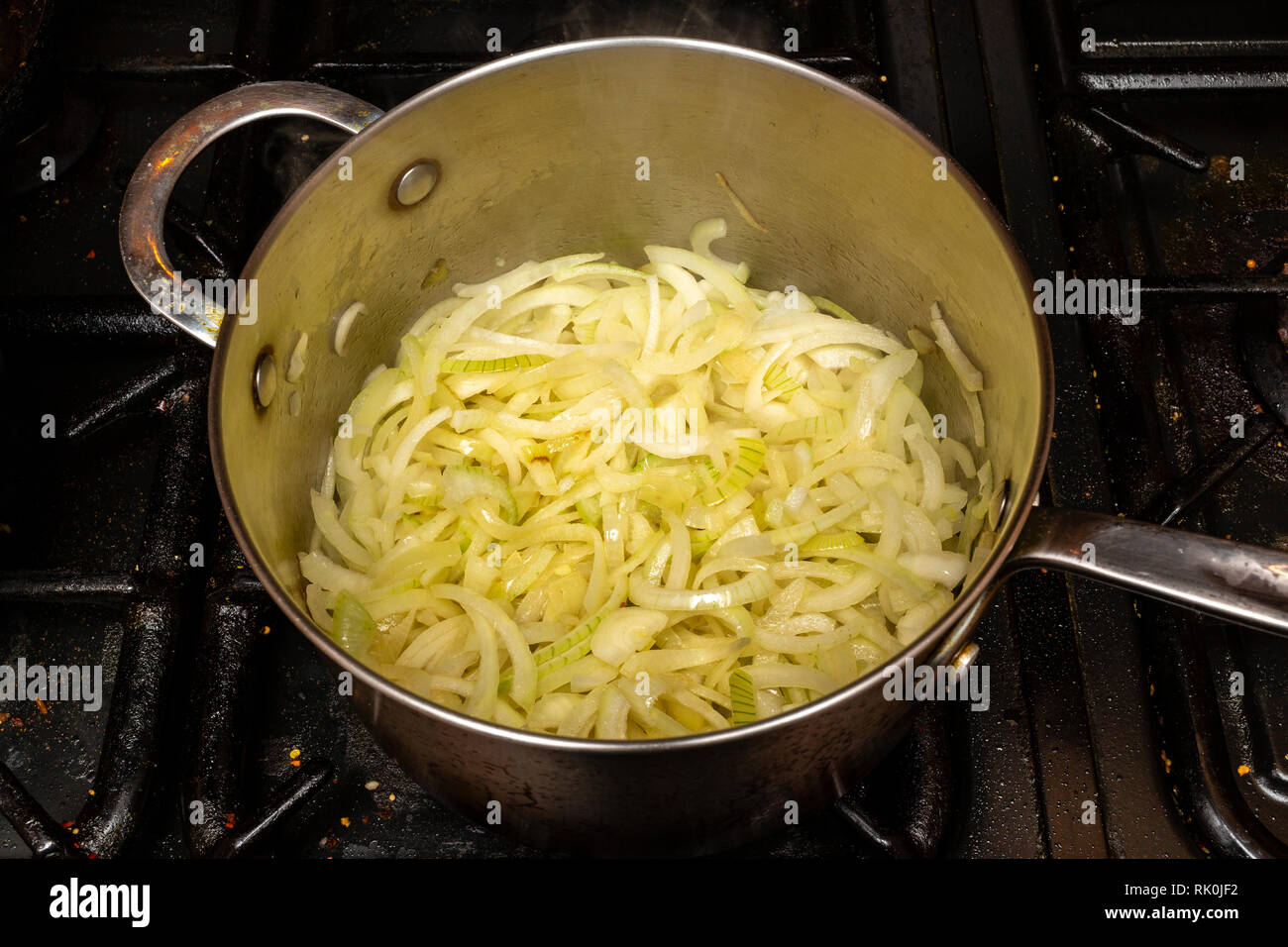 Onions fried in pan on hi-res stock photography and images - Alamy