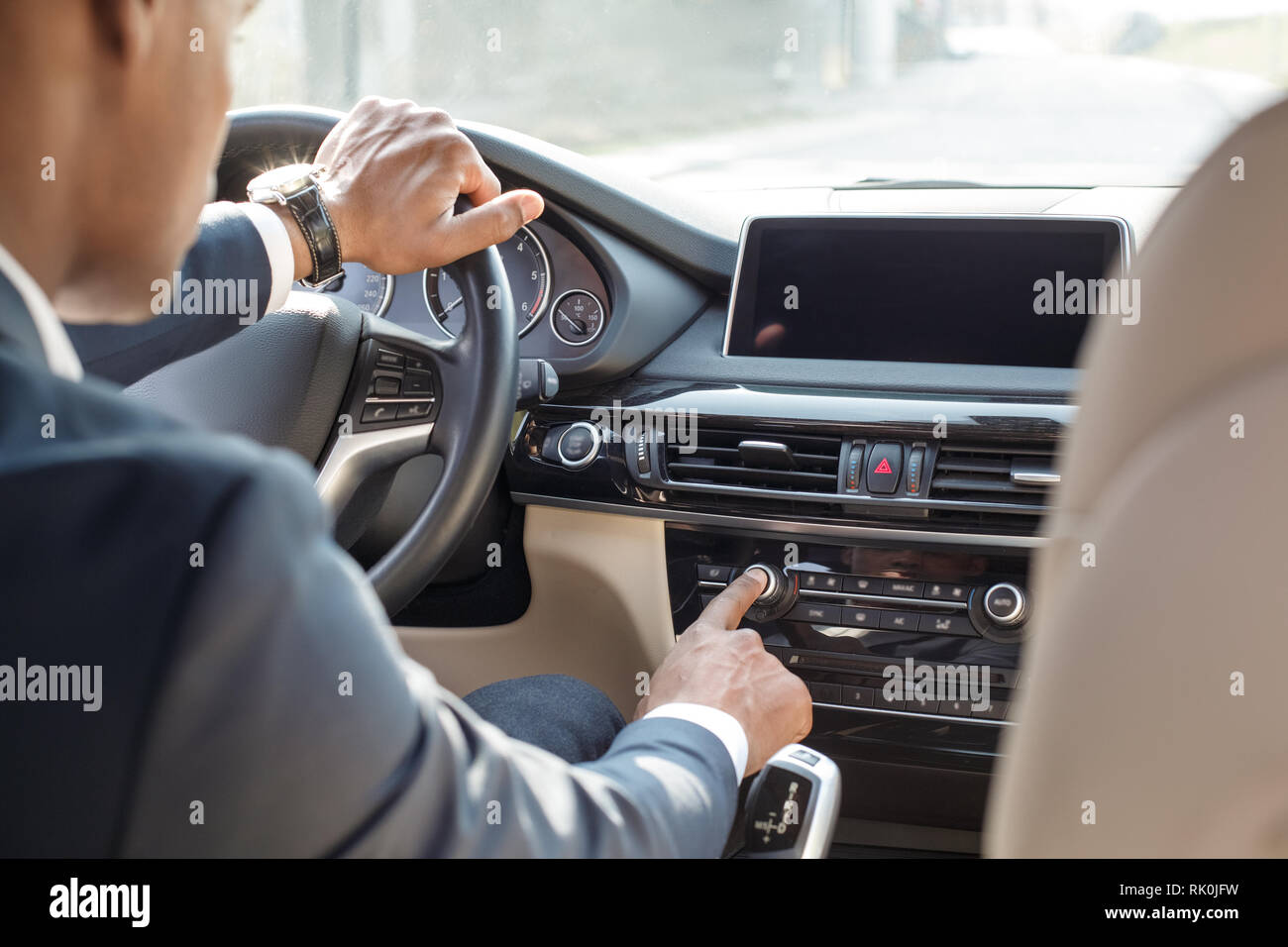 Sitting business man pushing back to hi-res stock photography and ...