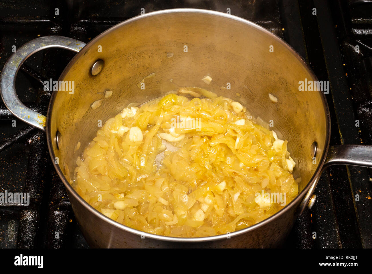Onions fried in pan on hi-res stock photography and images - Alamy