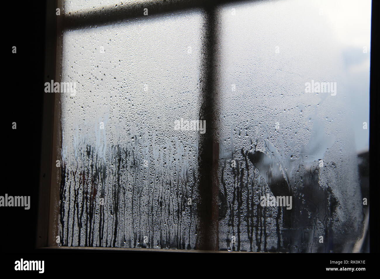 Misted window / Window with raindrops on the glass Stock Photo - Alamy