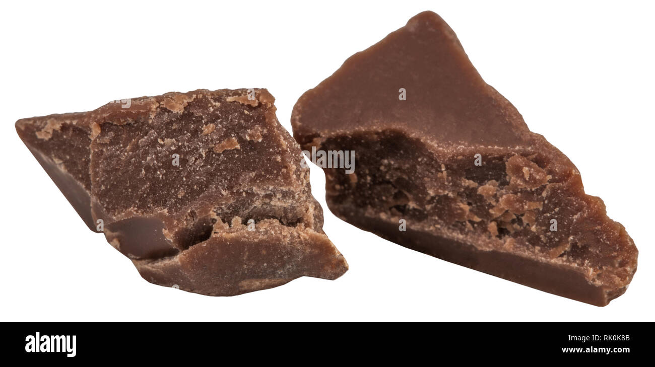 Broken chocolate pieces isolated on white background Stock Photo - Alamy