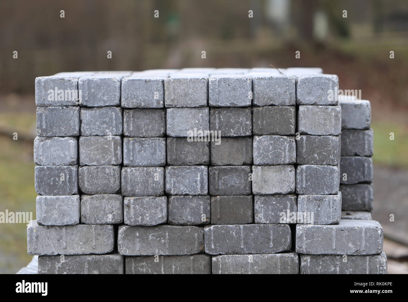 Stack of bricks / Bricks neatly stacked against the wall Stock Photo ...