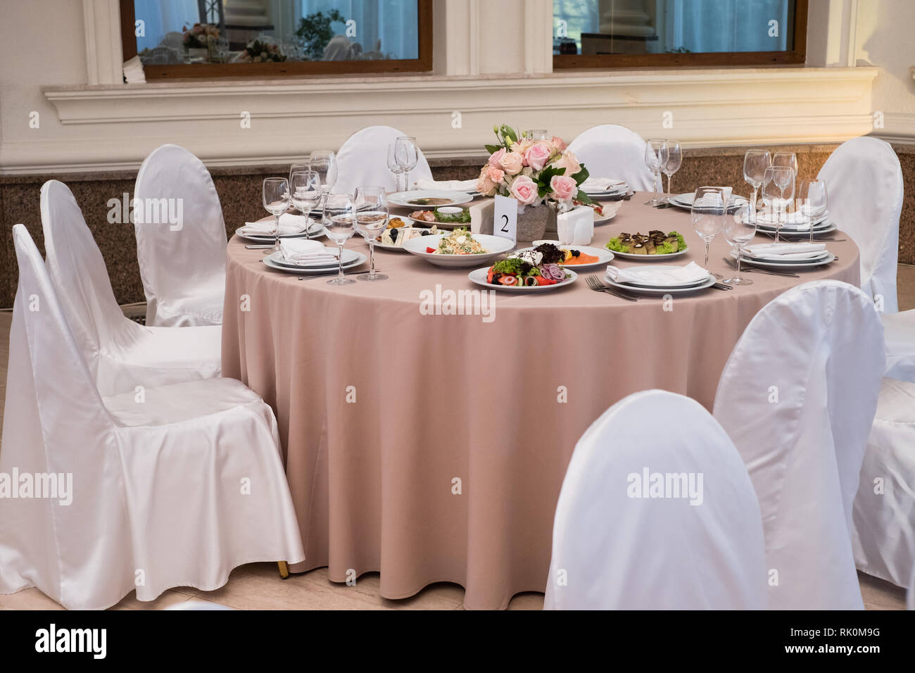 Served for banquet restaurant table with dishes, snack, cutlery, wine ...