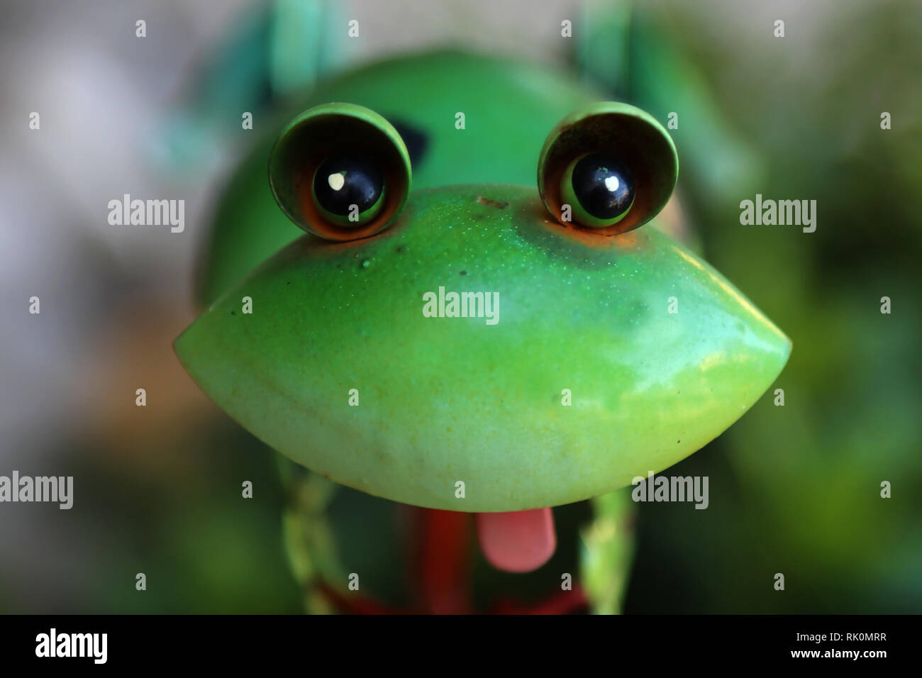 Decorative frog made of metal Stock Photo - Alamy