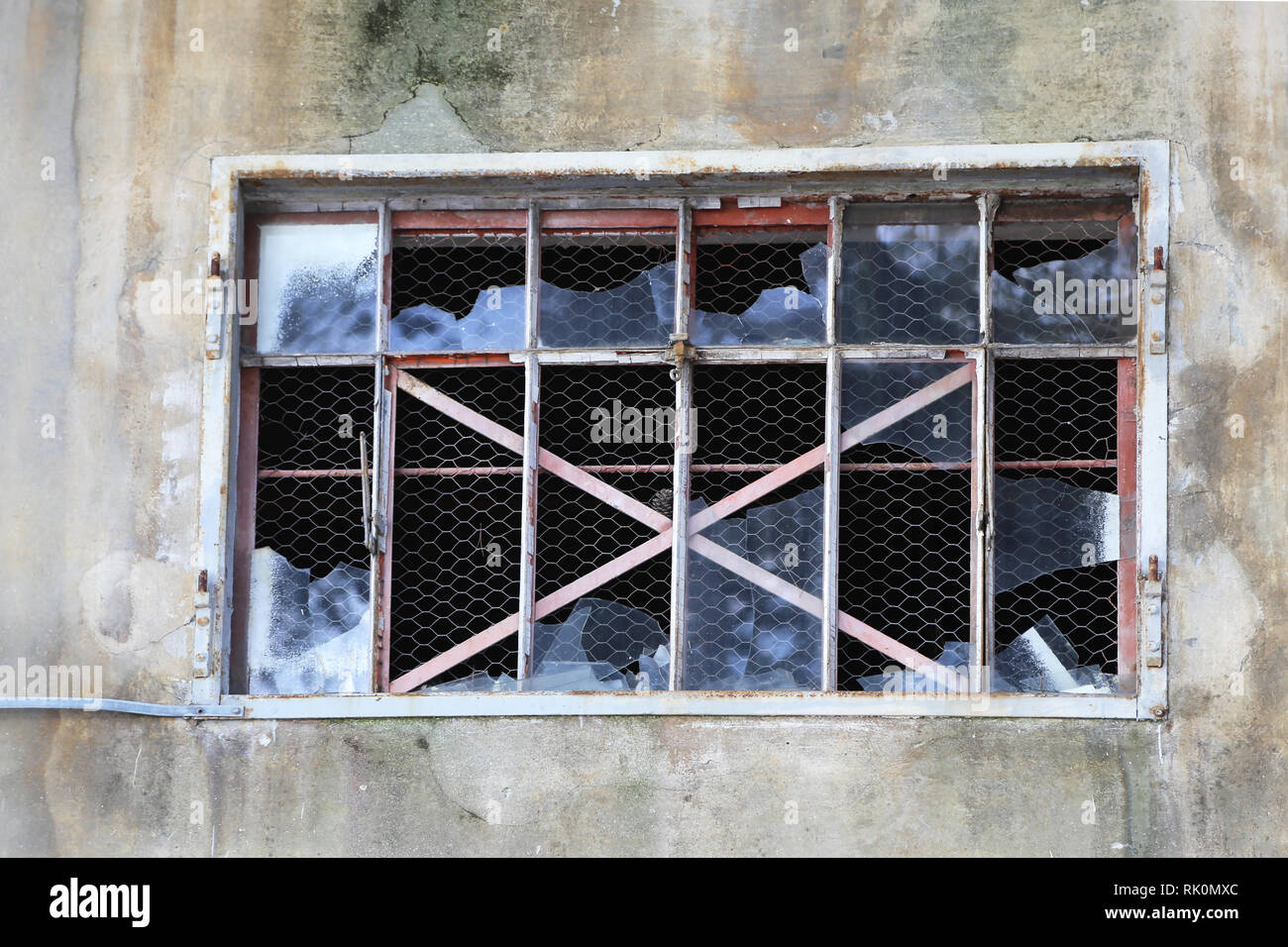 Window with broken windows in an abandoned house Stock Photo - Alamy