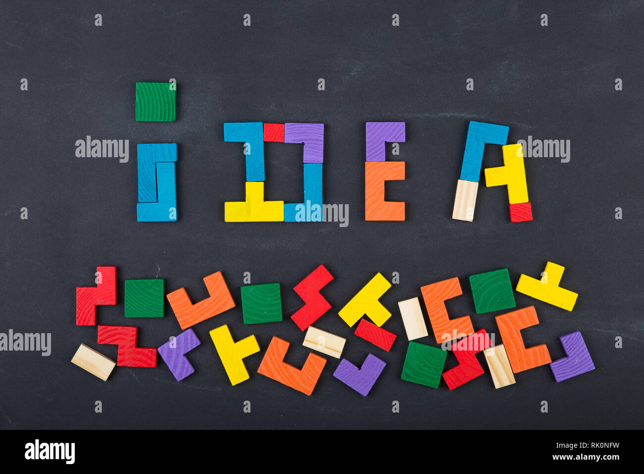 Business concept - Idea composed of color jigsaw blocks on the ...