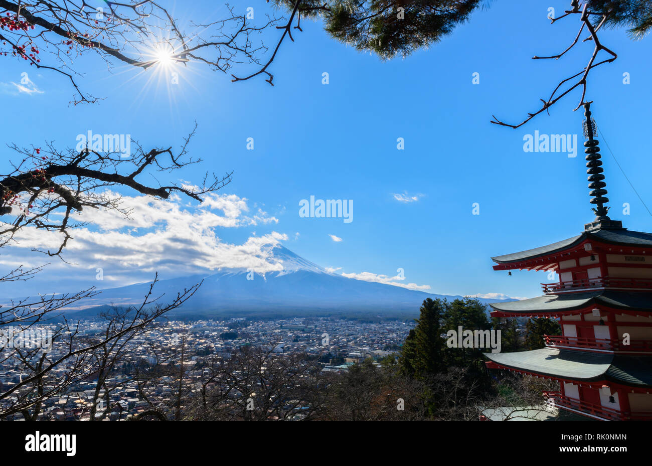 Mt. Fuji with Chureito Pagoda in autumn and cloudy blue sky ...