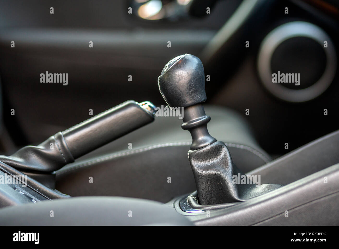 Luxurious car black leather interior. Handbrake manual brake and ...