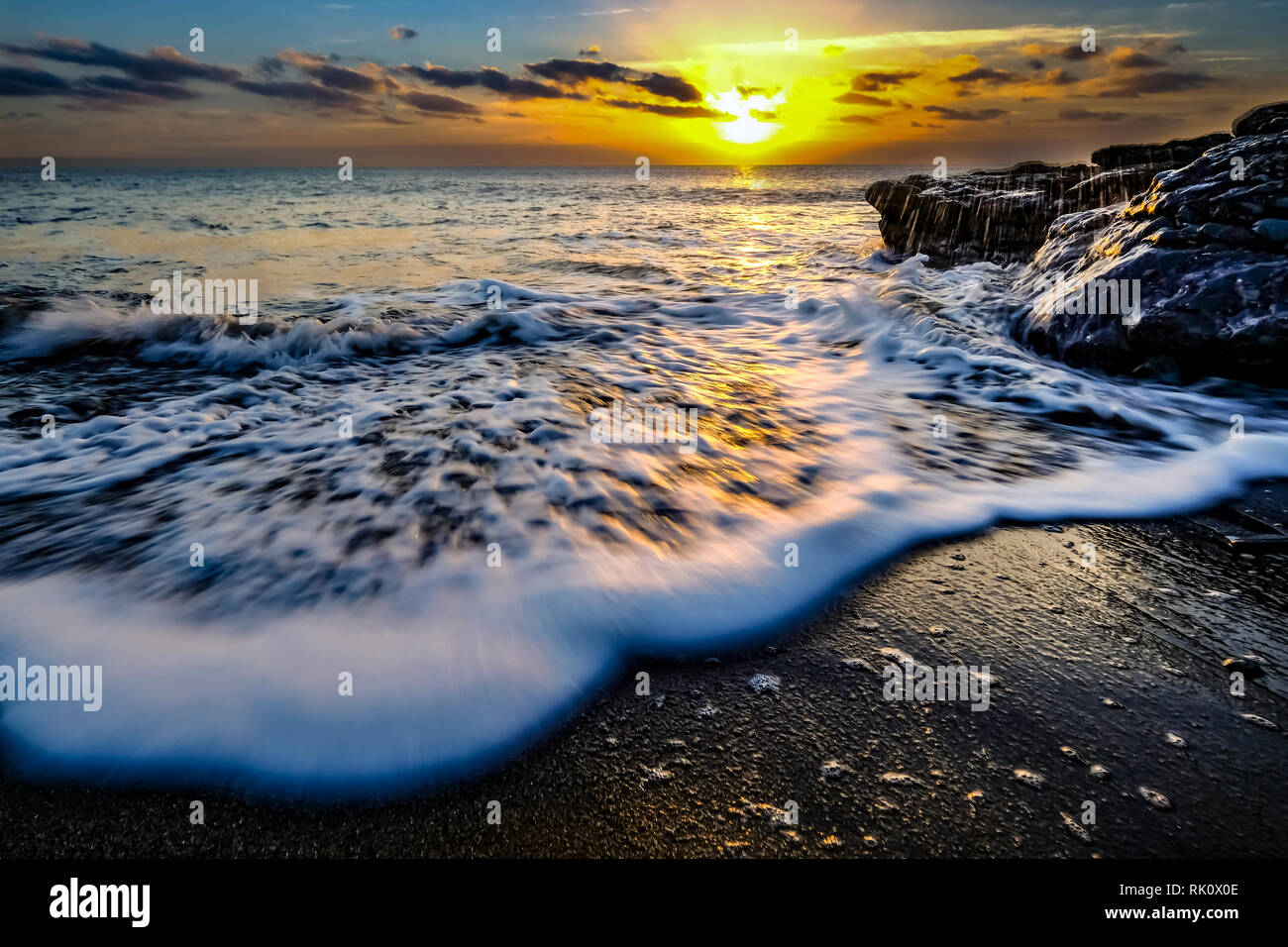 Coastal sunrises and sunsets in Wales Stock Photo - Alamy