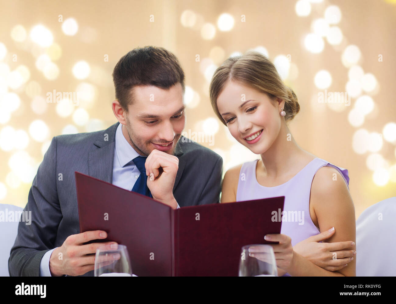 Beautiful young woman reading menu hi-res stock photography and images ...