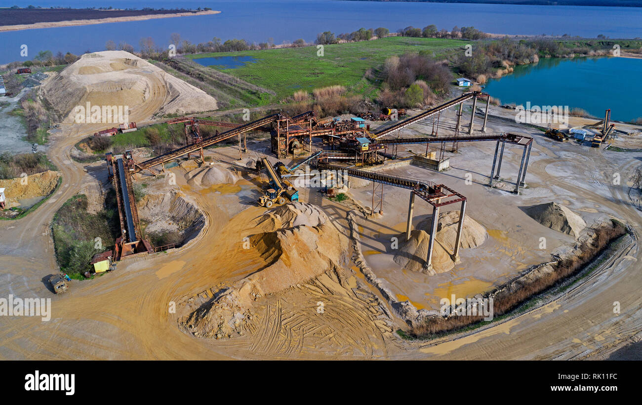 Panoramic view of sand quarry, mining of yellow construction sand ...