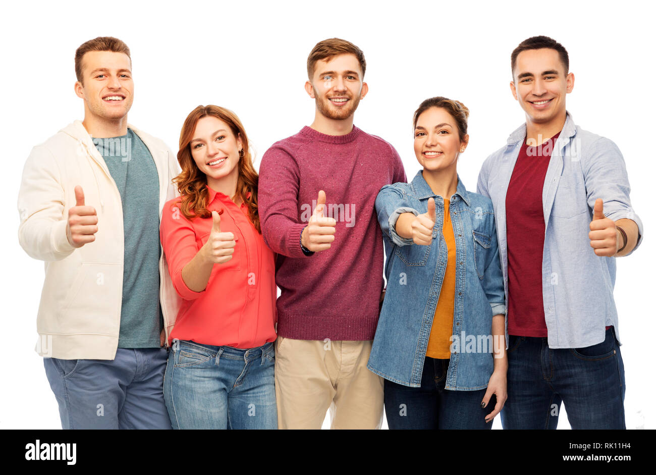 group of smiling friends showing thumbs up Stock Photo - Alamy