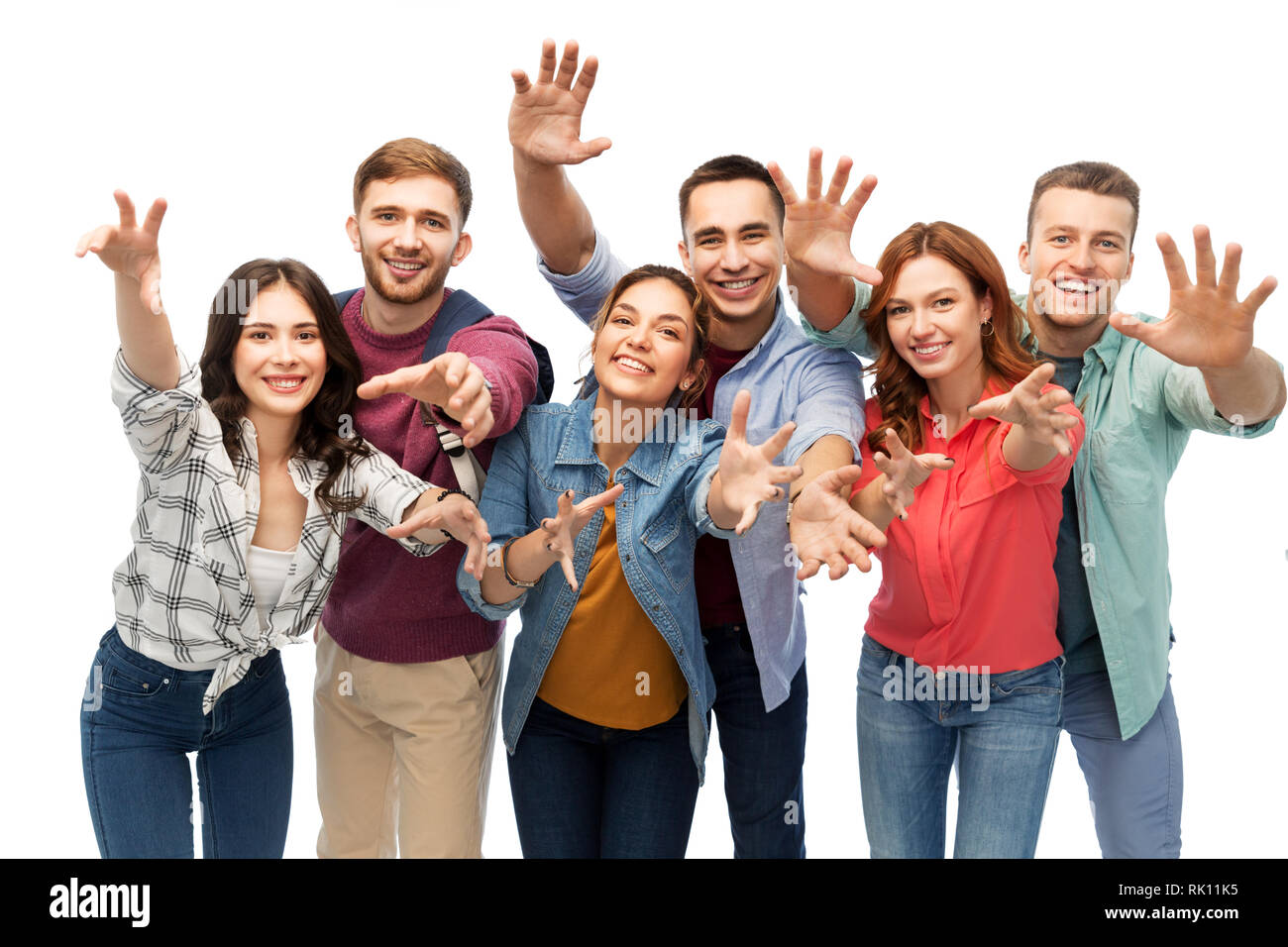 group of happy students over white background Stock Photo - Alamy