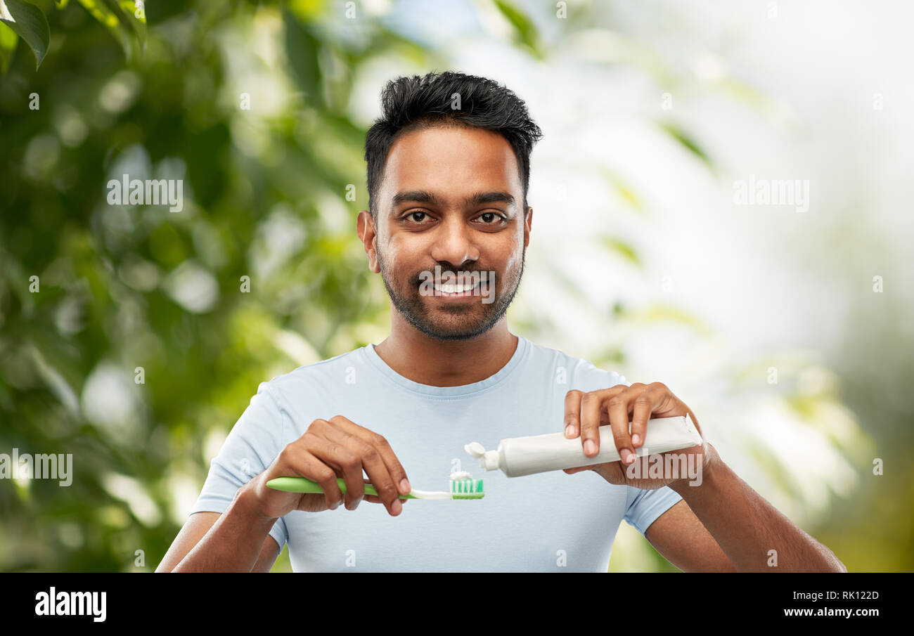indian man with toothbrush and toothpaste Stock Photo - Alamy
