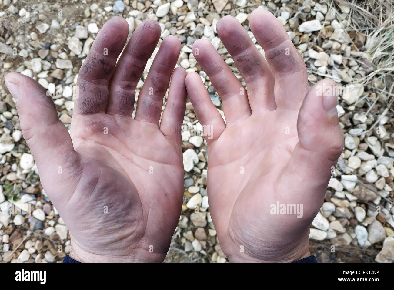 The dirty hands of the worker on the construction site 2019 Stock Photo ...