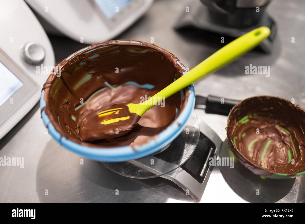 chocolate cream on kitchen scale at confectionery Stock Photo - Alamy