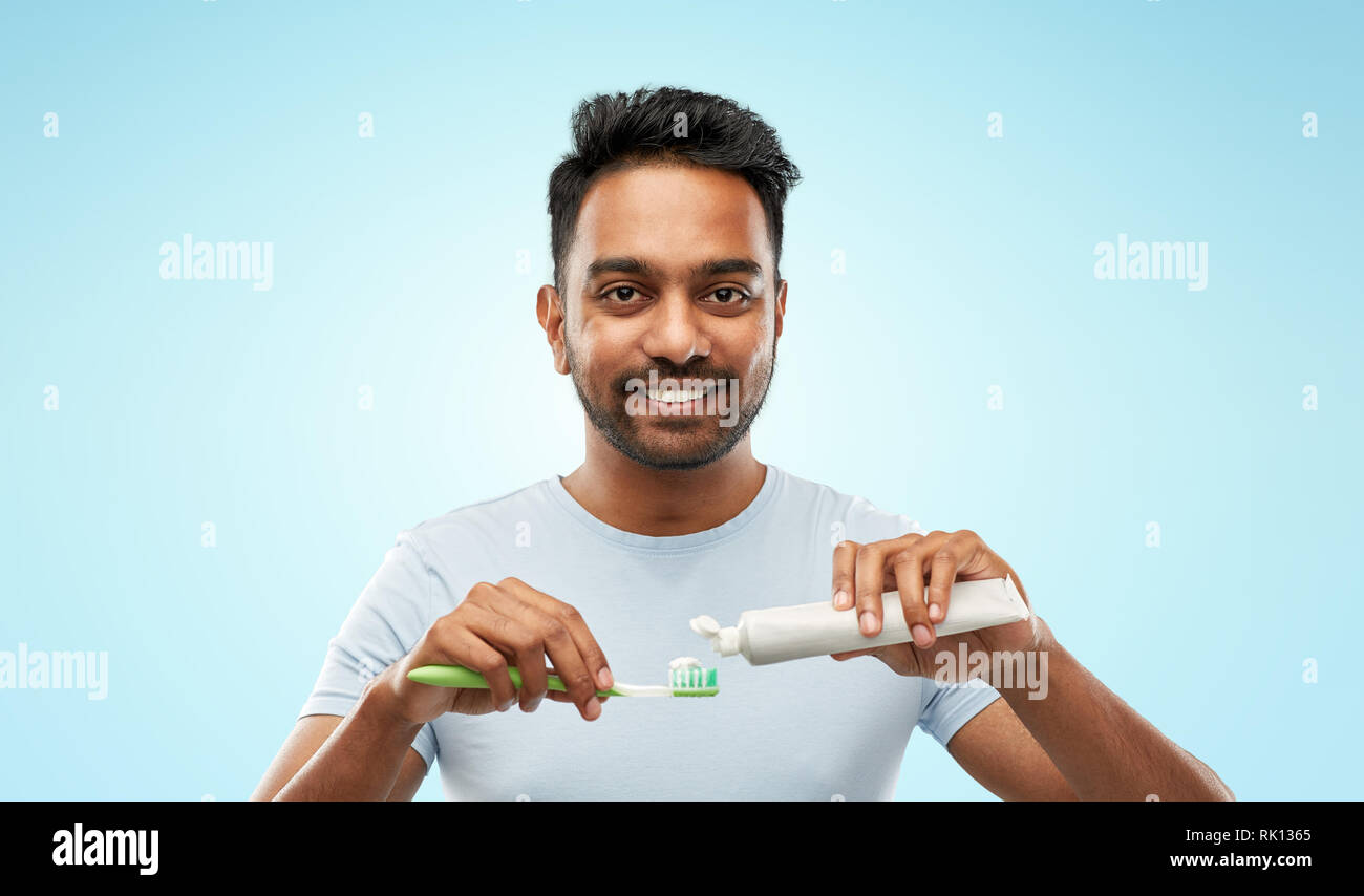 indian man with toothbrush and toothpaste Stock Photo - Alamy